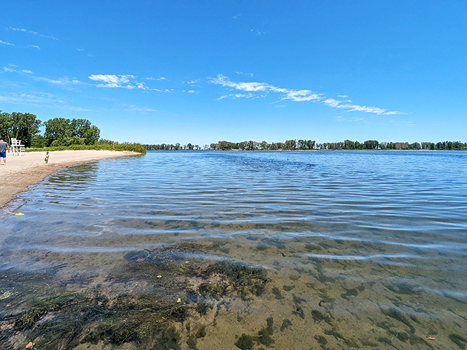 The sandy shores of Presque Isle Beach 11 stretch out like nature's welcome mat, offering a rare combination of lakeside tranquility and room to breathe.