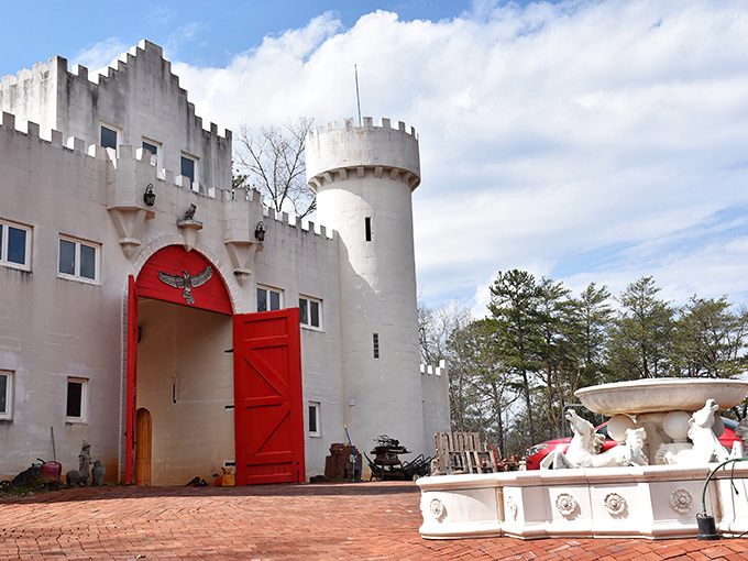 Uhuburg rises from the Georgia landscape like a fairytale illustration come to life, its white towers and terraced gardens creating an unexpected European mirage in Appalachia.