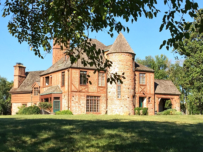 Redwall Castle stands proudly against the Maryland sky, its reddish-brown stonework and circular turret looking like it was plucked straight from a European countryside.