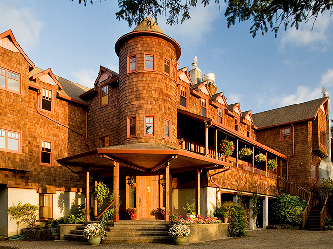A private balcony perched among autumn foliage offers the perfect spot for an evening glass of Oregon Pinot. Castle living meets forest bathing.