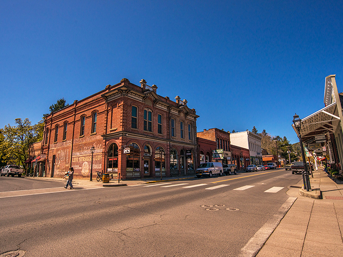 Jacksonville's aerial view reveals a perfect small-town grid nestled against forest-covered hills. Main Street could double as a movie set for "Charming America." 