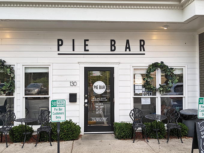 The charming white facade of Pie Bar beckons like a siren song for dessert lovers. Simplicity that promises complexity within.