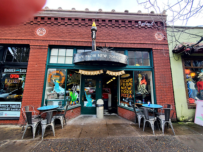 The unassuming brick exterior of Escape from New York Pizza on NW 23rd Avenue promises zero pretension and maximum flavor.