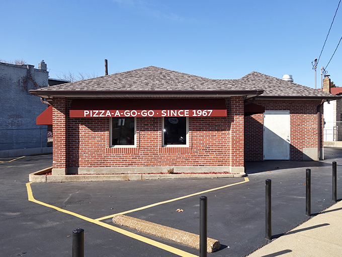 The unassuming brick exterior of Pizza-A-Go-Go has been welcoming hungry St. Louisans since 1967, proving great pizza doesn't need flashy signage. 
