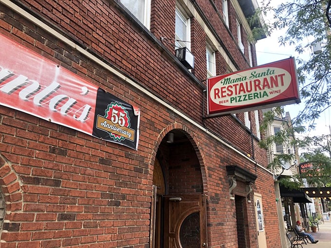 The unassuming brick corner that houses pizza paradise. Like Clark Kent's glasses, this modest exterior hides superhero-level Italian food inside. 