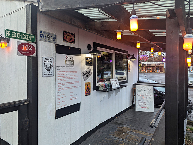 The unassuming exterior of Pyre Nashville Hot Chicken proves once again that culinary treasures often hide in the most modest packages.