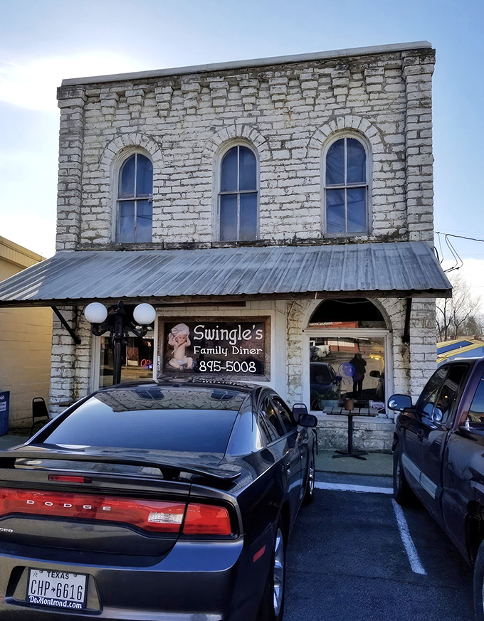 The historic limestone facade of Swingle's stands proudly in Salem, a time-honored beacon for breakfast pilgrims seeking salvation through perfect pancakes.