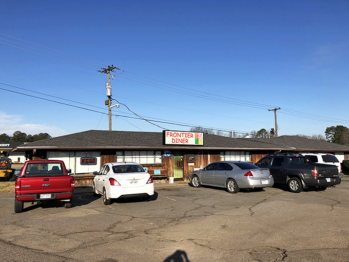 The unassuming wooden exterior of Frontier Diner stands as a beacon to breakfast enthusiasts across Little Rock&mdash;no fancy facade needed when the food speaks this loudly.