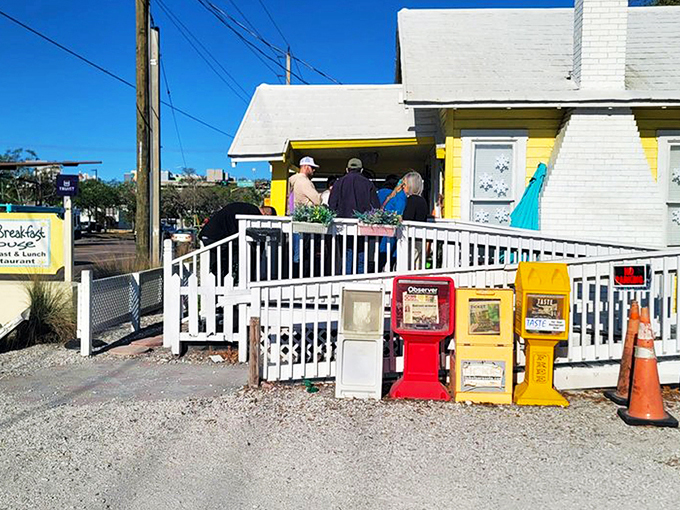 The sunshine-yellow cottage that houses The Breakfast House isn't just a restaurant—it's a morning promise wrapped in cheerful Florida charm.