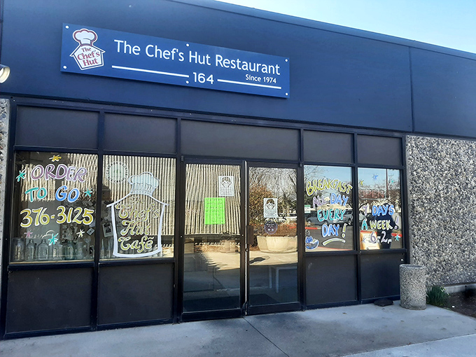 The unassuming blue exterior of The Chef's Hut promises no frills, just honest-to-goodness breakfast mastery that locals have treasured for decades.