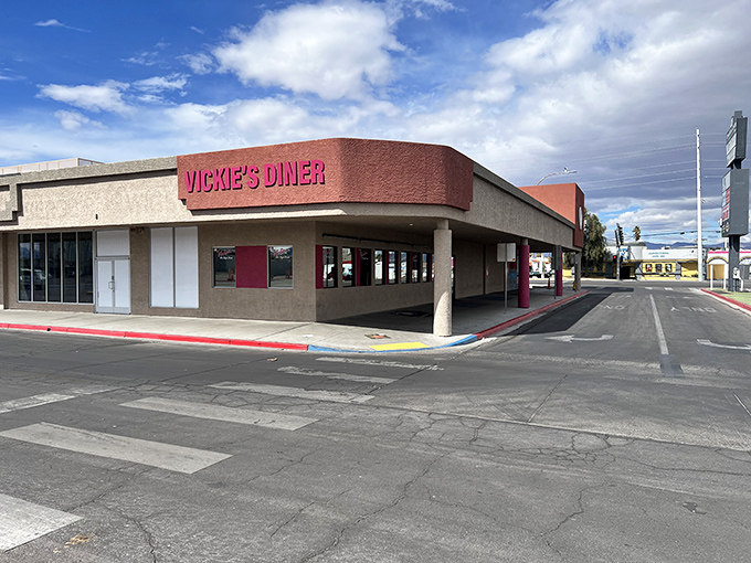 The pink beacon of breakfast hope on the Las Vegas horizon. Vickie's Diner's exterior promises comfort food salvation in a city that never sleeps.