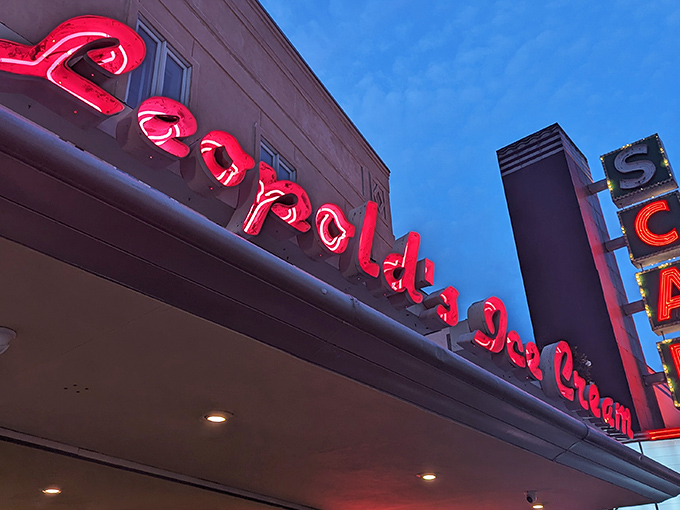 The iconic Leopold's marquee beckons like an old friend. That red neon sign isn't just advertising&mdash;it's promising happiness by the scoop.
