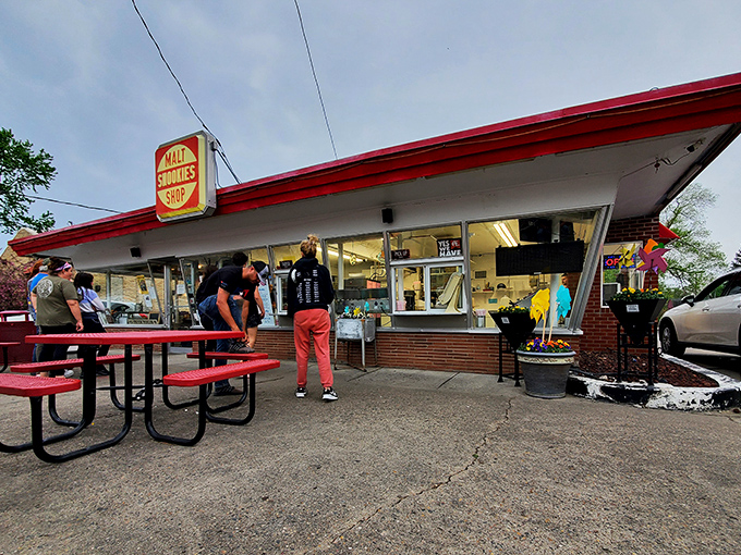 The iconic red and white Snookies sign stands like a beacon of frozen delight, promising sweet relief from Iowa summer heat.