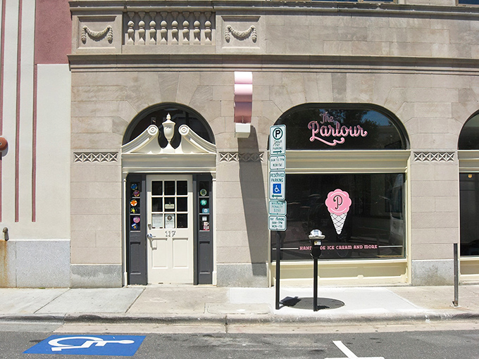 The historic storefront of The Parlour beckons with its elegant arches and charming pink logo—Durham's equivalent of finding Willy Wonka's golden ticket.