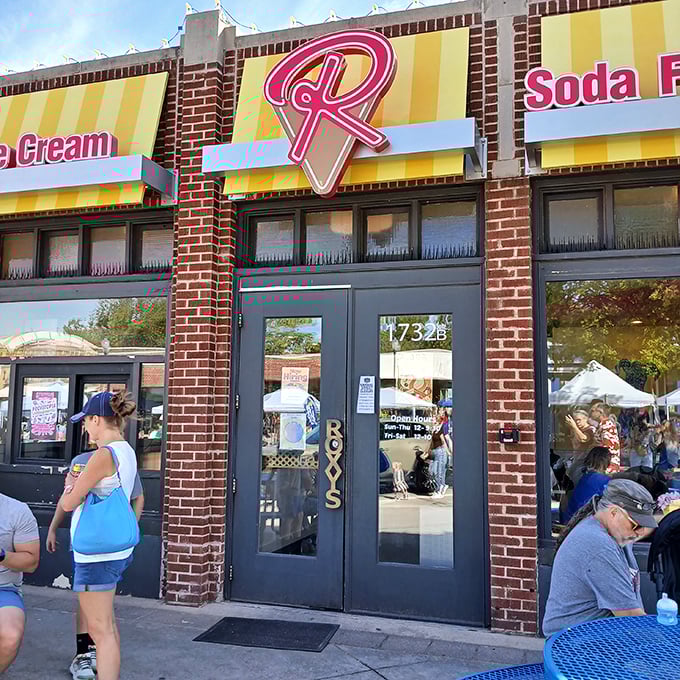 The iconic yellow awnings and signature "R" logo of Roxy's beckon like a sweet siren call, promising frozen bliss in Oklahoma City's vibrant Plaza District.