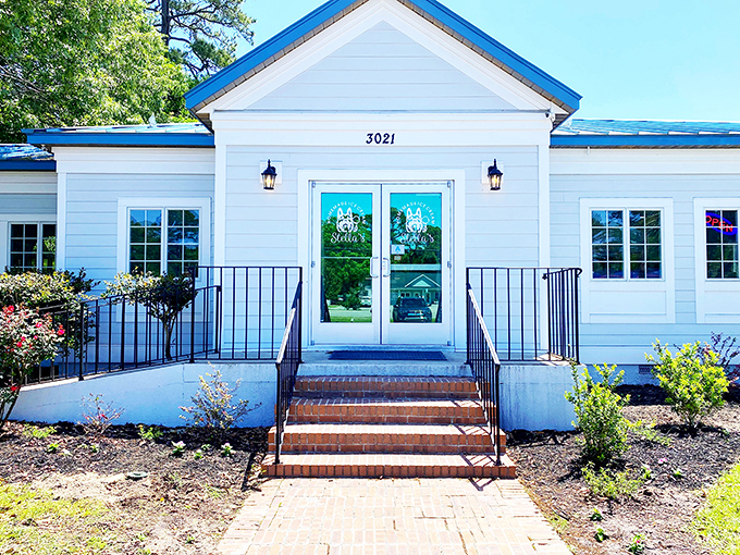 The charming white cottage with blue trim isn't just a pretty facade&mdash;it's the gateway to frozen nirvana at Stella's Homemade Ice Cream in Murrells Inlet.