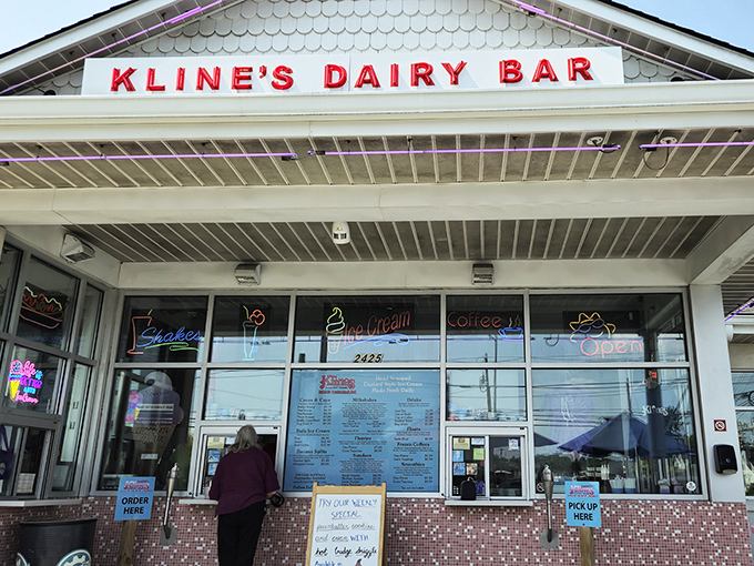 The iconic red lettering of Kline's Dairy Bar beckons like a lighthouse for ice cream pilgrims. Simple, unpretentious, and promising cold comfort on hot Virginia days.