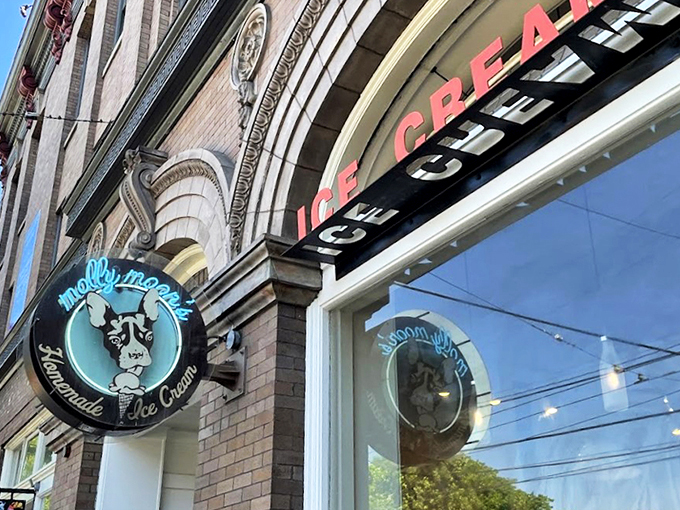 The architectural equivalent of "come hither" &ndash; Molly Moon's storefront beckons with its classic brick fa&ccedil;ade and neon glow, promising sweet relief from Seattle's bustling streets.