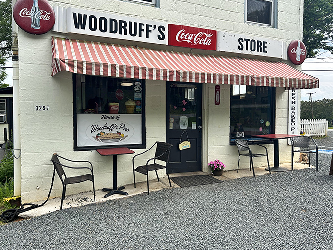 The classic red-and-white striped awning and vintage Coca-Cola signs aren't retro decoration&mdash;they're authentic pieces of Woodruff's history as a former general store.