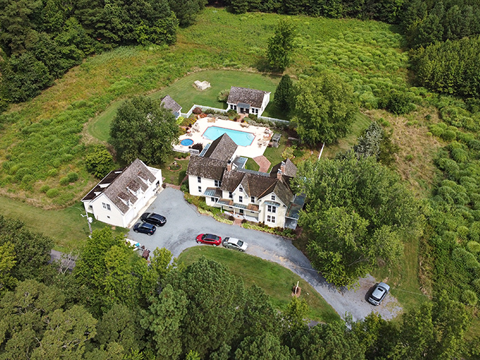 An aerial view that answers the eternal vacation question: "Pool or hot tub?" At George Brooks House, the correct answer is clearly "both."