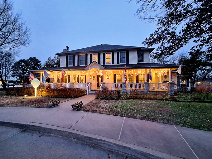The Montford Inn stands proudly with its patriotic bunting, like that neighbor whose house always makes you feel a little guilty about your own curb appeal.