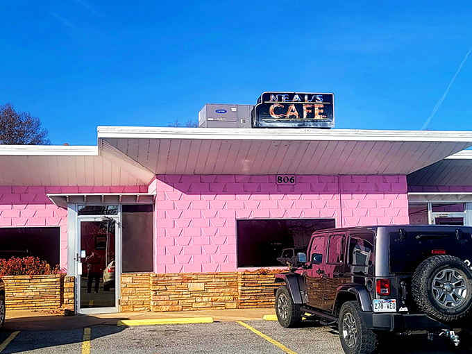 The pink palace of poultry stands proudly against the Arkansas sky, like a delicious mirage beckoning hungry travelers from miles around.