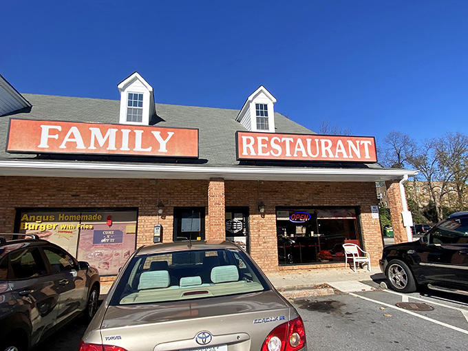 The culinary equivalent of a warm hug awaits behind those bold orange signs. Family Restaurant's unassuming exterior in Duluth promises zero pretension and maximum comfort. 