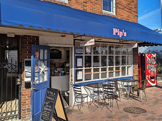 The little blue awning on Dock Street beckons like a nautical flag signal that translates to "Come get the best hot dogs in Annapolis right here!"