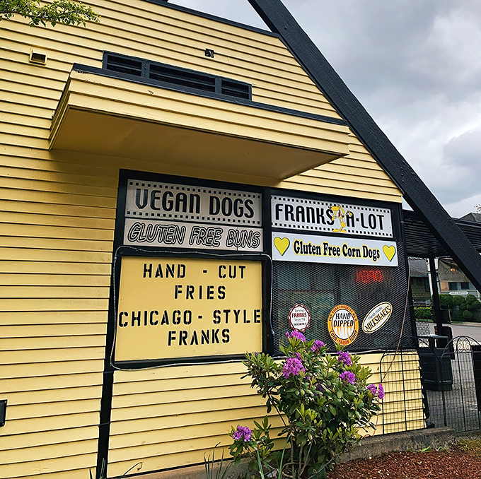 The sunshine-yellow A-frame stands like a beacon of hope for the hungry. Portland's hot dog paradise doesn't need fancy architecture to make a statement.