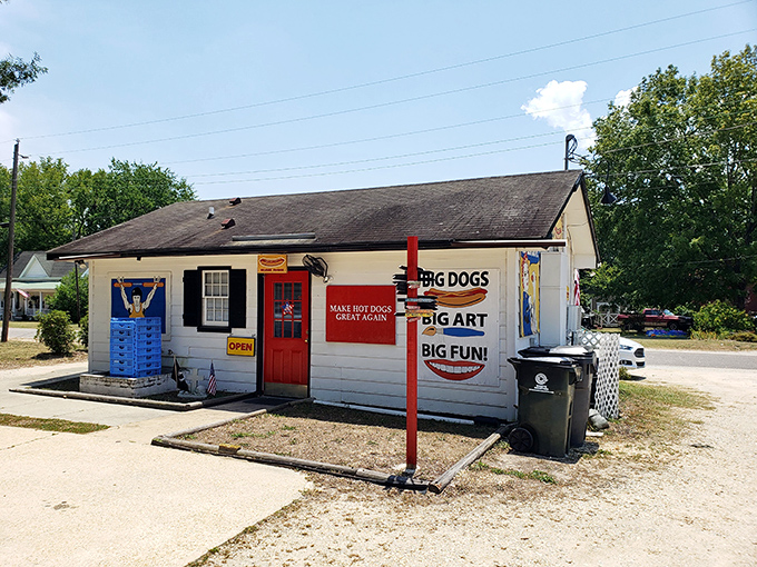 Don't judge a dog by its doghouse! This unassuming white building with its cheerful red door houses hot dog magic that draws devotees from miles around.