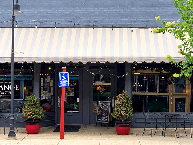The classic storefront of La Grange Coffee Roasters beckons with its striped awning and string lights, like a caffeine-fueled oasis on Main Street.