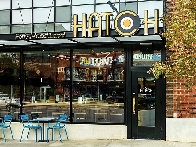 The sunny yellow exterior of Hatch announces its presence like a breakfast beacon, complete with that iconic egg-in-the-O logo.