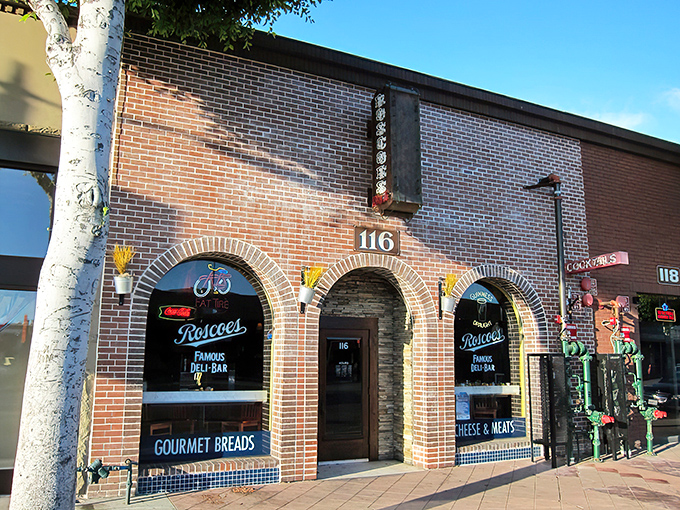 The red brick exterior of Roscoe's isn't just a building&mdash;it's a beacon for sandwich lovers. Those patio umbrellas promise shade, but the real protection you'll need is for your shirt.