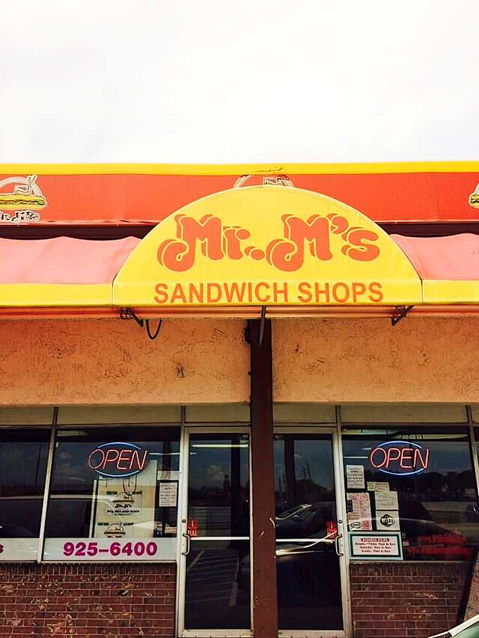 The red and yellow awning of Mr. M's beckons like a sandwich lighthouse in a sea of strip mall mediocrity. Simplicity never looked so inviting.