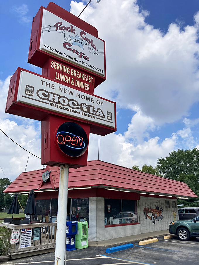 The iconic red roof of Rock-Cola 50's Cafe stands as a beacon of nostalgia along Indianapolis streets. Even the vintage sign promises good times ahead.
