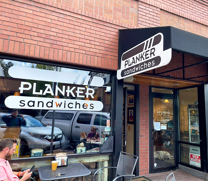 The unassuming brick storefront of Planker Sandwiches beckons like a lighthouse for the hungry. Simple signage, extraordinary sandwiches waiting inside.