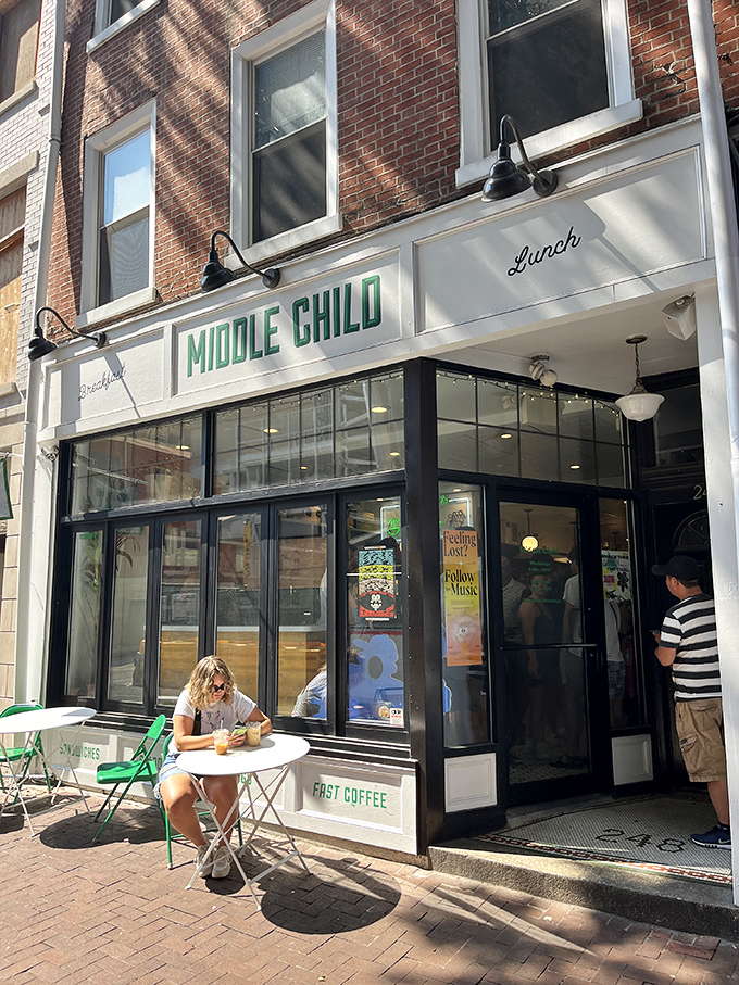 Middle Child's crisp white storefront with vibrant green signage stands like a beacon for sandwich pilgrims on Philadelphia's 11th Street. 