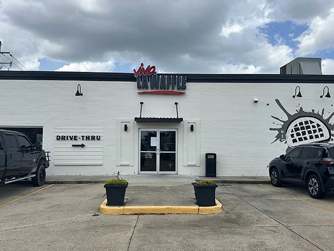 The unassuming white exterior of Viva La Waffle hides a culinary revolution within. Like finding a diamond in a plain setting.