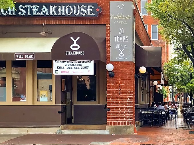 The brick facade of Y.O. Ranch Steakhouse beckons carnivores to Dallas' historic West End like a meaty lighthouse guiding hungry ships to shore.