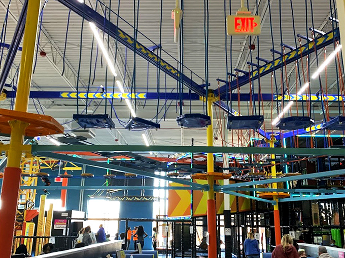 The climbing walls at Urban Air offer a Tetris-like challenge with colorful handholds. Who knew scaling a brick facade could be this much fun? 