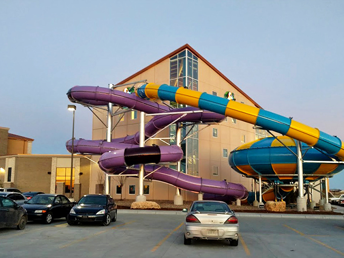 The architectural equivalent of a "come hither" gesture&mdash;colorful water slides beckoning from the exterior like tropical serpents promising aquatic thrills.