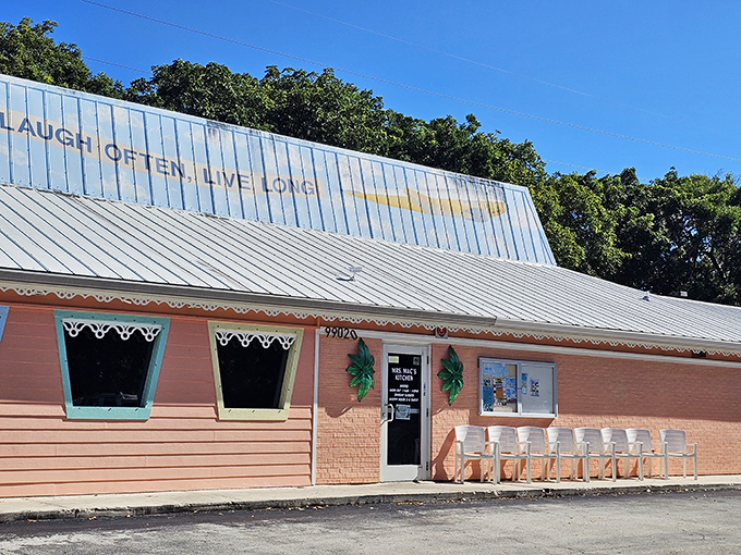 "Laugh Often, Live Long" isn't just a motto painted on this coral-colored sanctuary—it's the promise Mrs. Mac's Kitchen delivers with every Key lime bite.