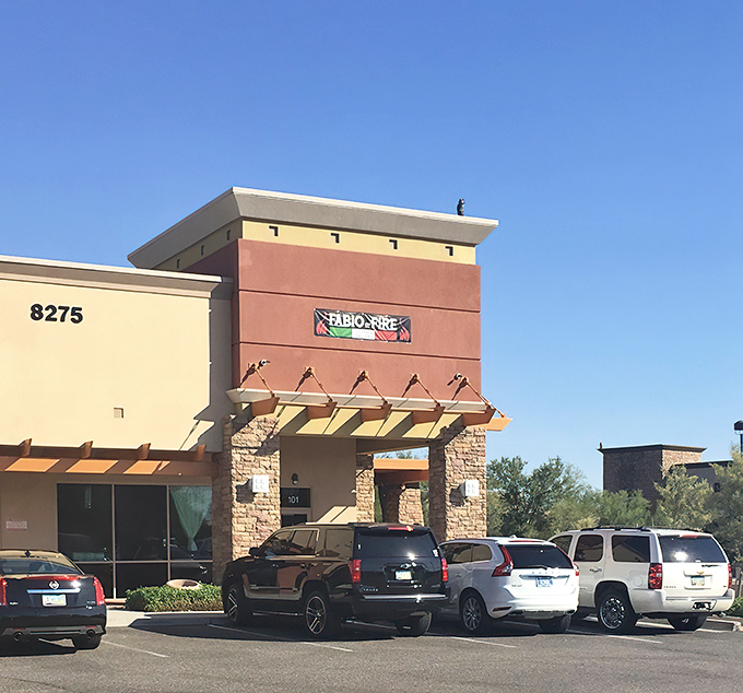 The unassuming desert-toned exterior of Fabio On Fire might not scream "authentic Italian," but inside awaits a culinary adventure that would make any nonna proud.