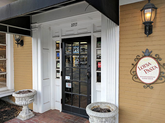 The unassuming yellow brick fa&ccedil;ade of Lotsa Pasta beckons like an old friend. That ornate sign promises Mediterranean treasures await behind that classic black door.
