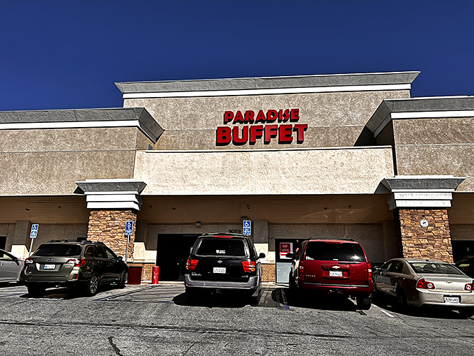 The red signage beckons like a lighthouse for the hungry, promising culinary abundance inside this unassuming strip mall treasure. 