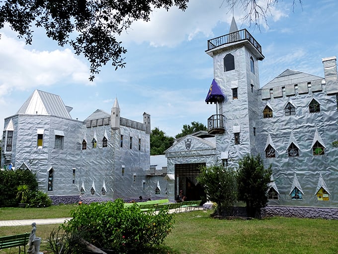 The shimmering facade of Solomon's Castle catches Florida sunlight like a medieval disco ball, complete with vibrant pink flowers that seem to bow in admiration.