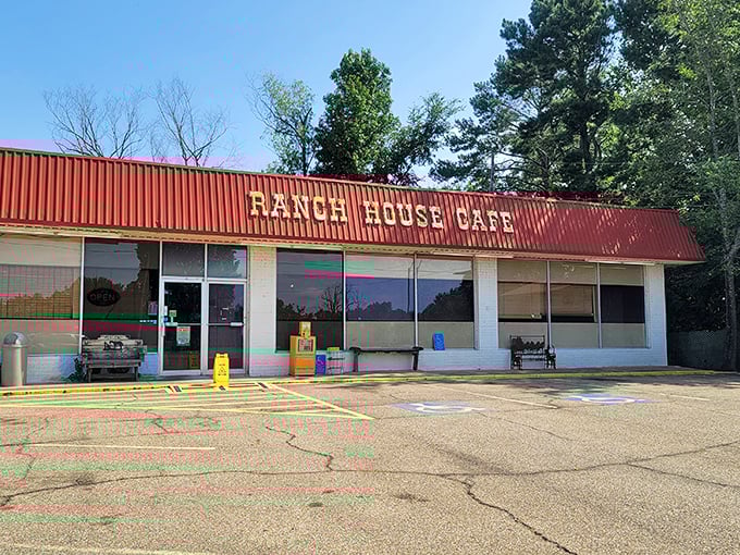 The bright red roof of Ranch House Cafe beckons hungry travelers like a culinary lighthouse on the Arkansas horizon.