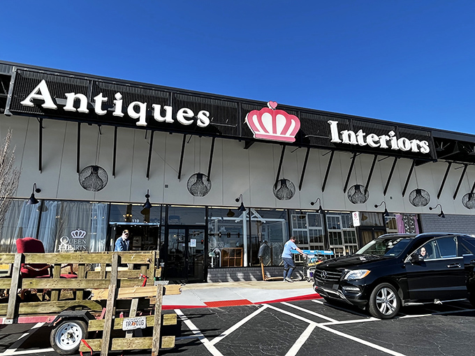 The royal welcome! Queen of Hearts Antiques & Interiors stands proudly in Marietta, its crown logo promising treasure hunters a kingdom of vintage delights inside.