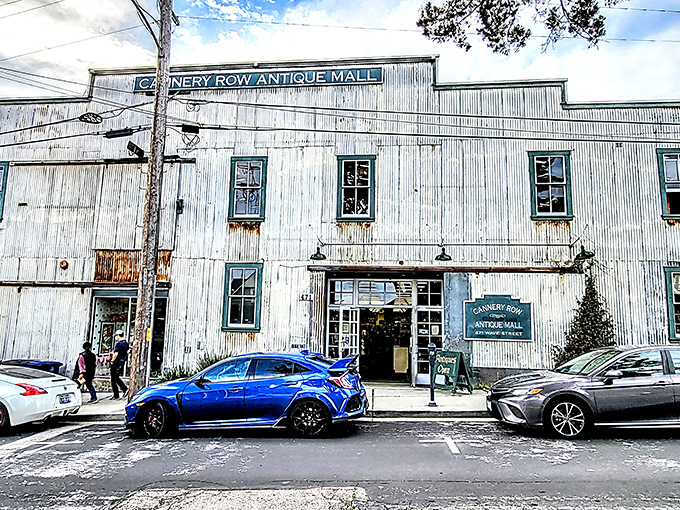 The weathered corrugated exterior of Cannery Row Antique Mall stands as a time capsule itself, housing treasures that span decades within its industrial bones.