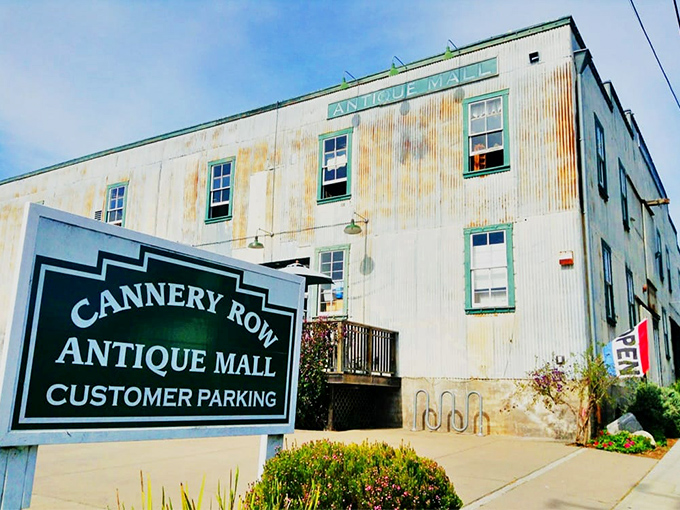 The weathered corrugated exterior of Cannery Row Antique Mall stands as a time capsule itself, housing treasures that span decades within its industrial bones.
